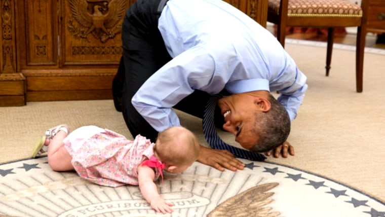 President Obama plays with baby girl in sweet photo