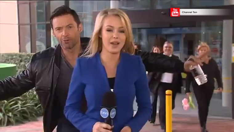 Hugh Jackman surprises, delights TV reporter with on-camera photobomb