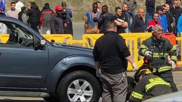 3 Killed, Several Injured as Vehicle Plows into Crowd at Car Auction