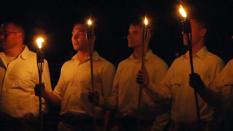 White nationalists carrying torches march in Charlottesville