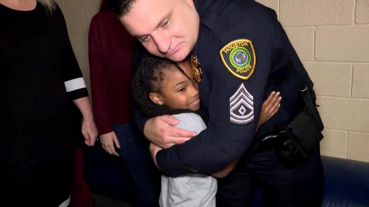 This 7-year-old girl is out to hug police officers in all 50 states