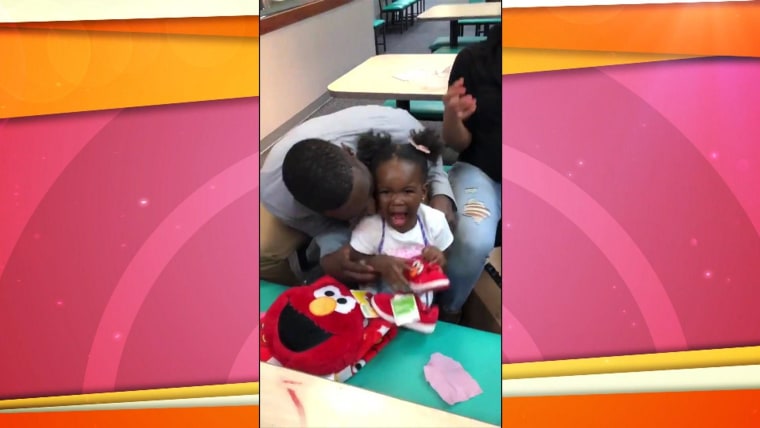 For the love of Elmo! Little girl overjoyed by new Muppet sneakers