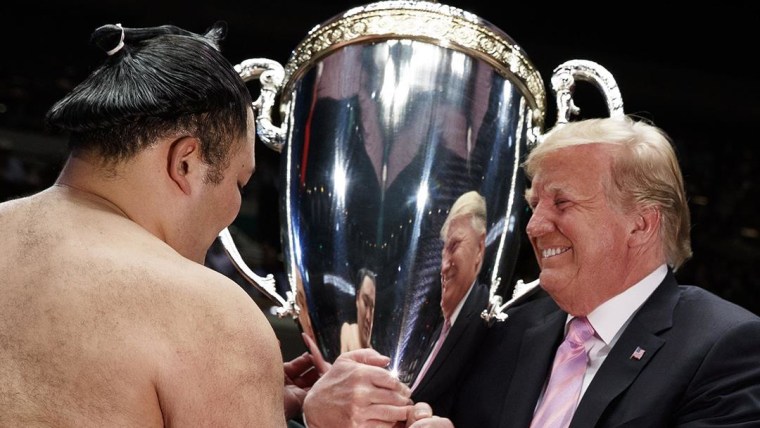 Trump awards sumo trophy as Tokyo charm offensive continues