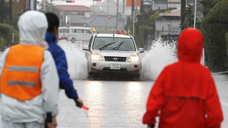 Residents told to evacuate homes as heavy rain pounds southern Japan
