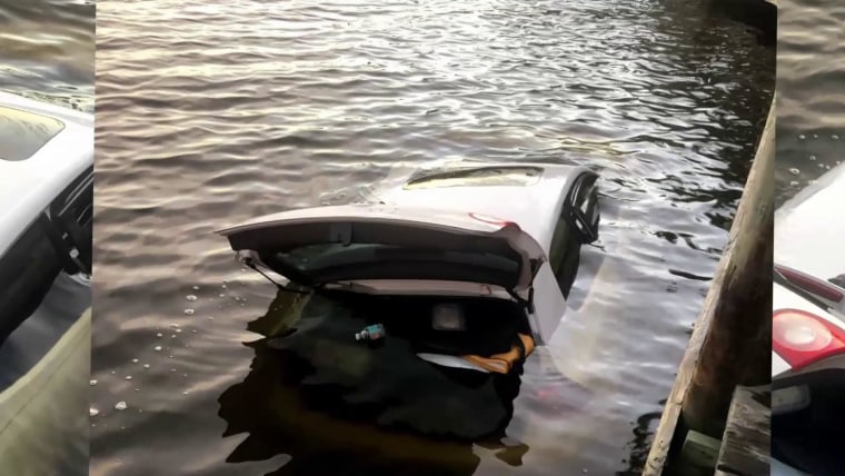 Kayaker rescues woman trapped overnight in partially submerged vehicle