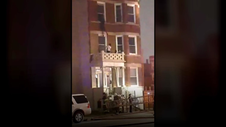 People flee Chicago apartment fire by jumping out window