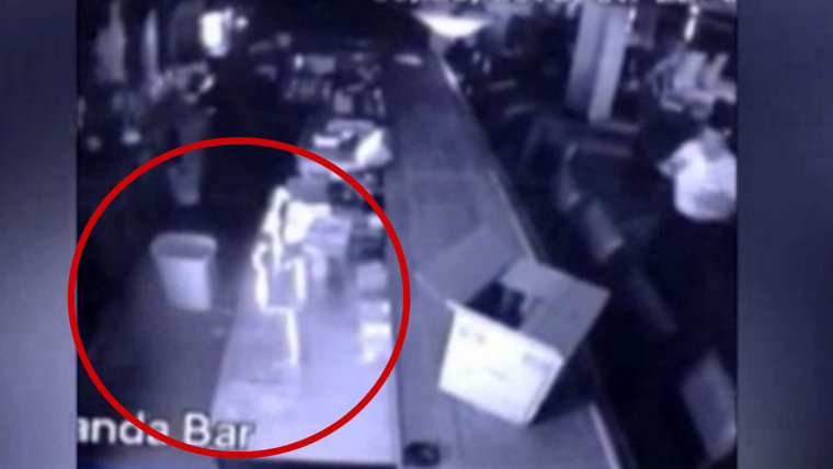 Does surveillance video show ghost haunting a bar?