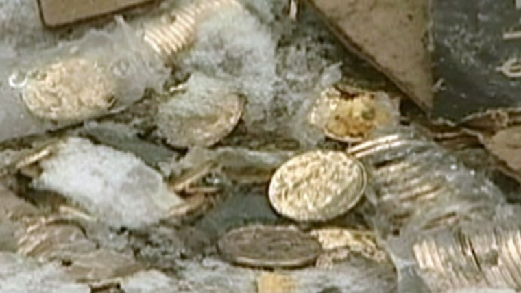 Can you spare a dime? Coins spill onto road