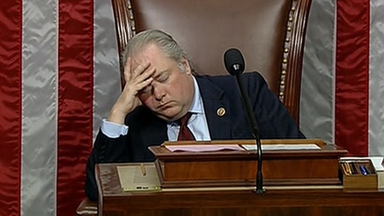Rep. Holding falls asleep overseeing House floor