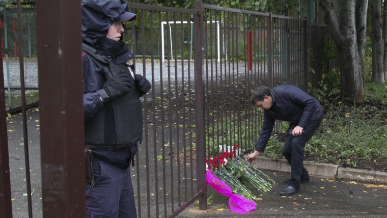 Swastika-wearing gunman kills 15, wounds 24 in school shooting in Russia