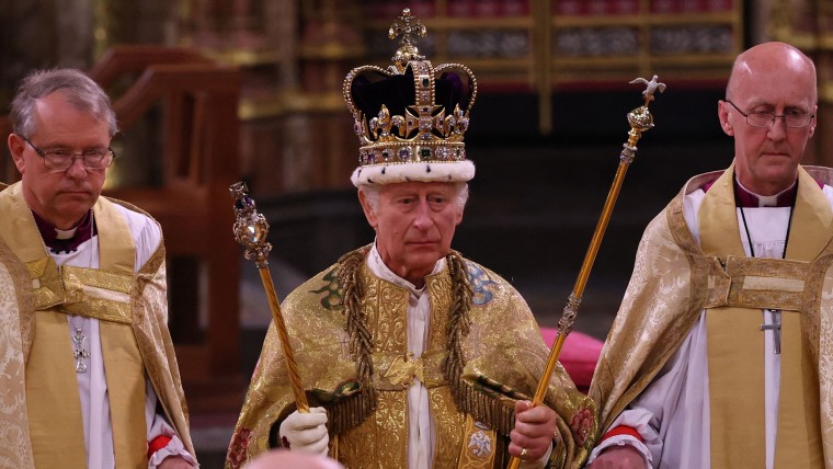 Prince William presents regalia to his father King Charles