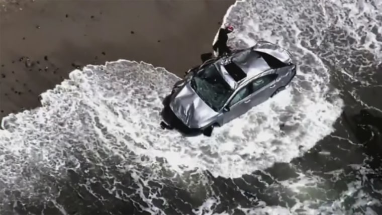 Driver injured after car plunges off 300-foot cliff in California