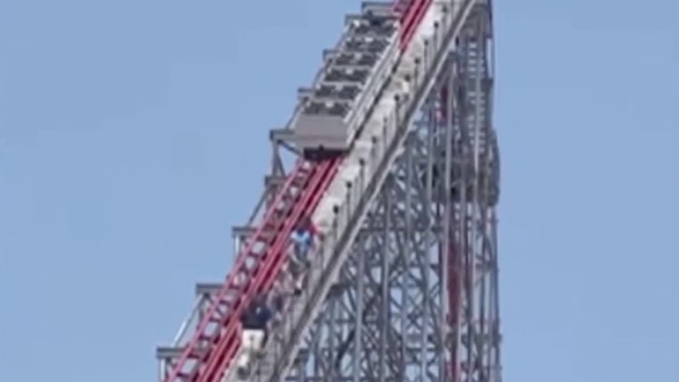 Riders get stuck near the top of a Cedar Point roller coaster