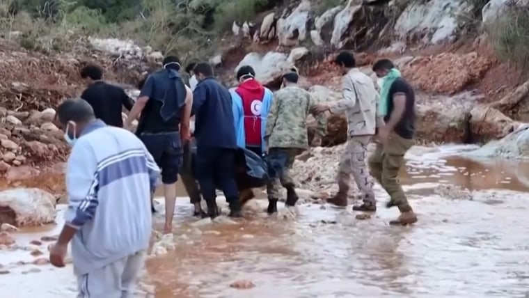 Volunteers collect bodies of flood victims in Derna, Libya