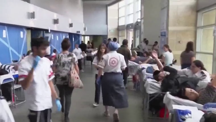 Israelis donate blood and volunteer to help victims