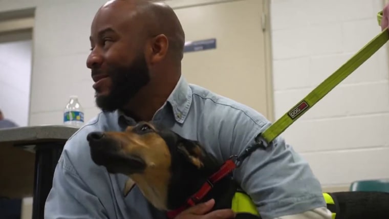 Virginia program pairs inmates and shelter dogs to work together