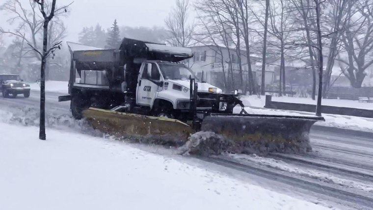 Winter storms dump snow on both U.S. coasts as icy roads make for hazardous travel