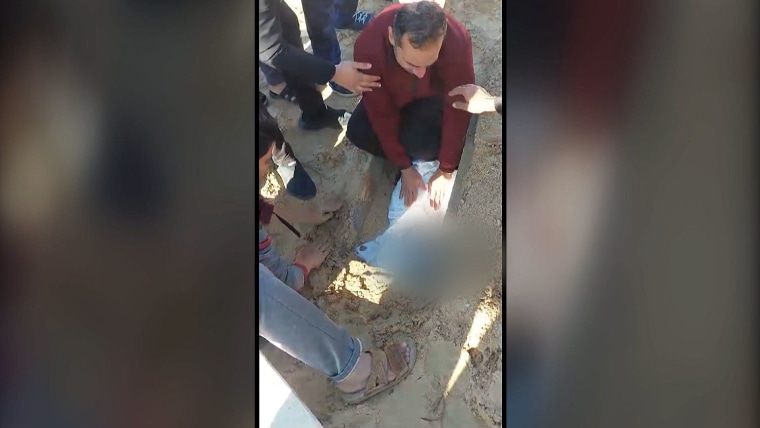 Gazan father Ahmad Rouqa left alone as he buries baby daughter Tala in ...