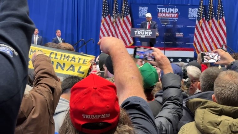 Trump Iowa event interrupted by climate protesters