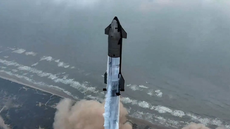 SpaceX successfully launches its Starship megarocket to orbit, returning it to Earth for the ...