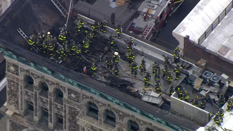 Firefighters respond to New York City rooftop fire