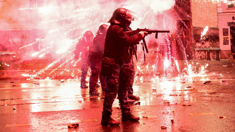 Protesters in Tbilisi, Georgia, throw fireworks at police as unrest ...