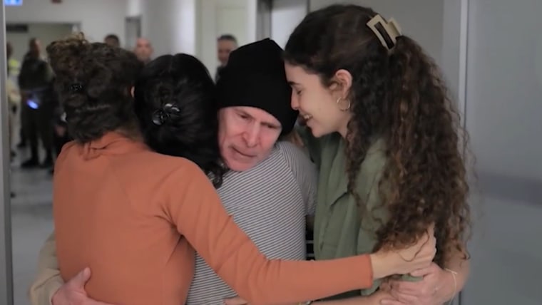 Watch: Keith Siegel and other released hostages reunite with their families