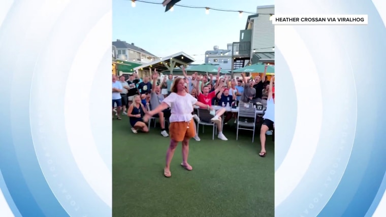 Kylie and Jason Kelce Cheer on Winner of Hula Dog Contest