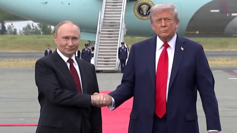 Trump and Putin meet on red carpet ahead of summit in Alaska