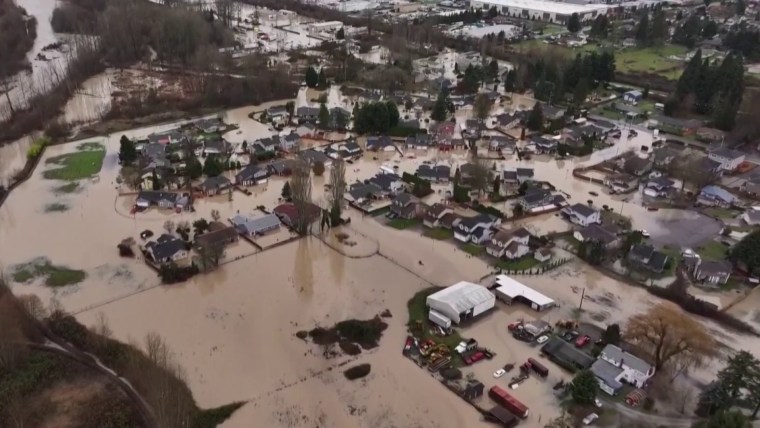 Deadly flooding threatens millions in Pacific Northwest