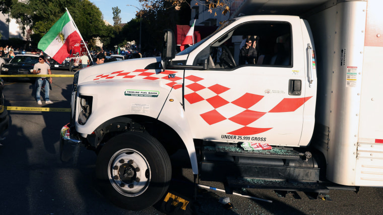 Protesters try to attack driver after truck speeds through anti-Iran ...