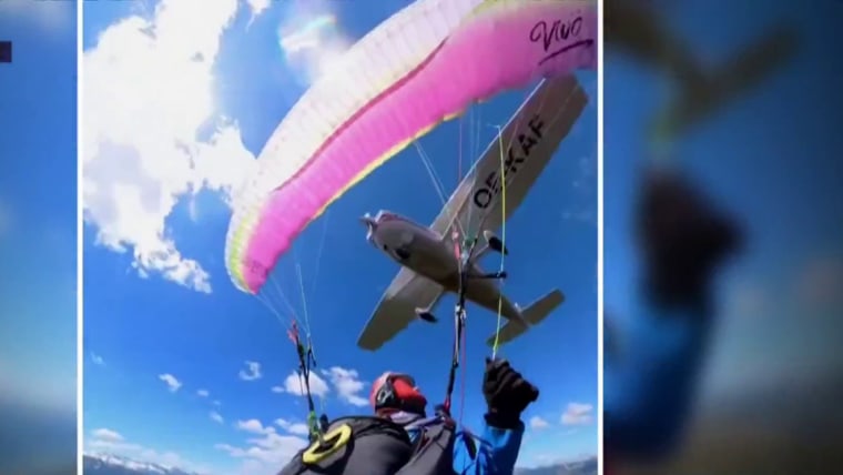 Paraglider escapes death after plane tears through parachute canopy