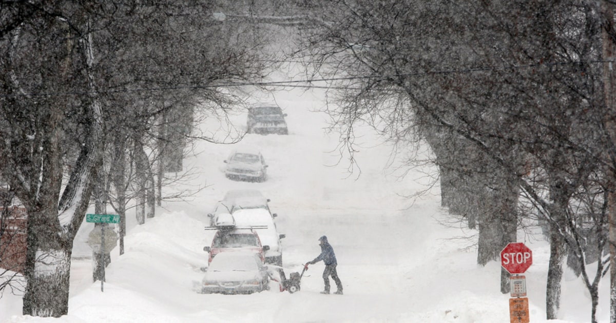 19 inches! Midwest digs out after more snow, ice
