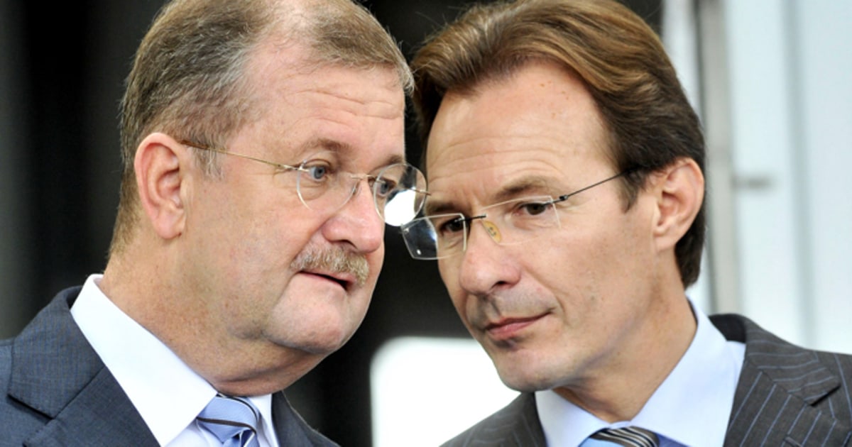 Porsche CEO quits, VW agrees to merger plan