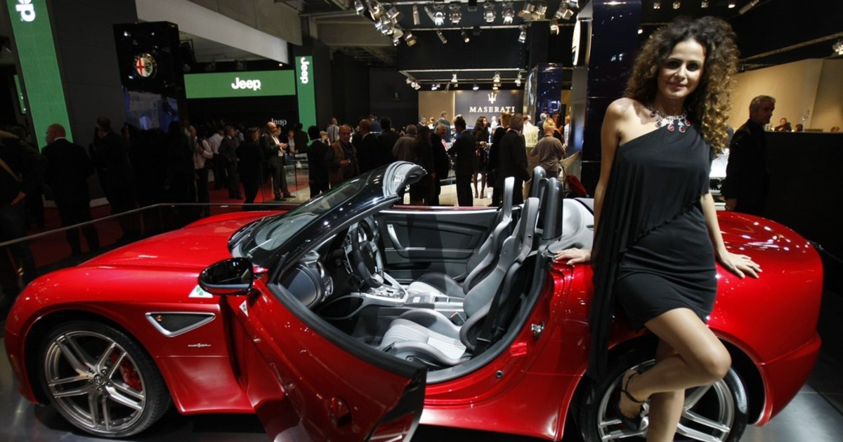 Carmakers cover up sexy models to win over women