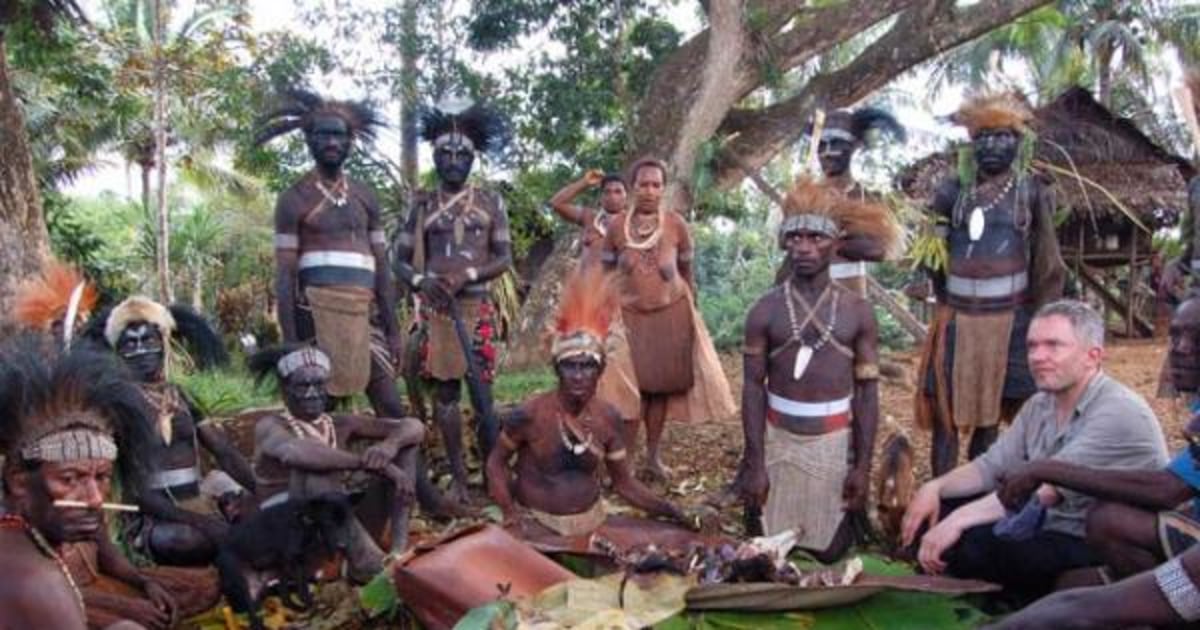 Former cannibal tribe lets him pull up a chair