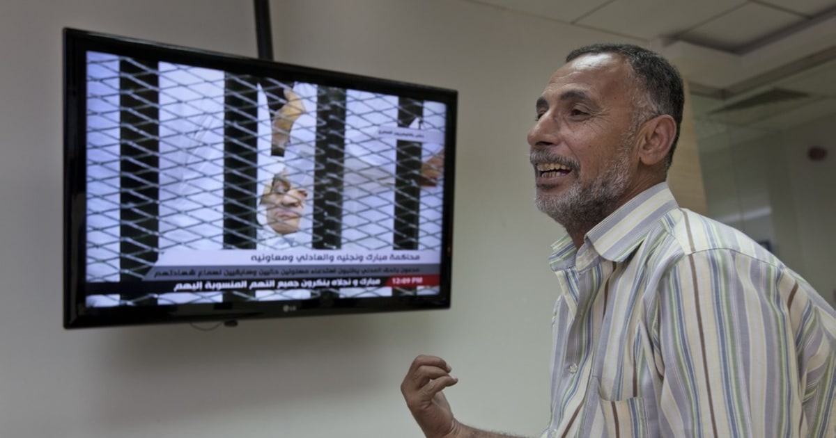 Mubarak's regime victim eyes trial with anger, disbelief