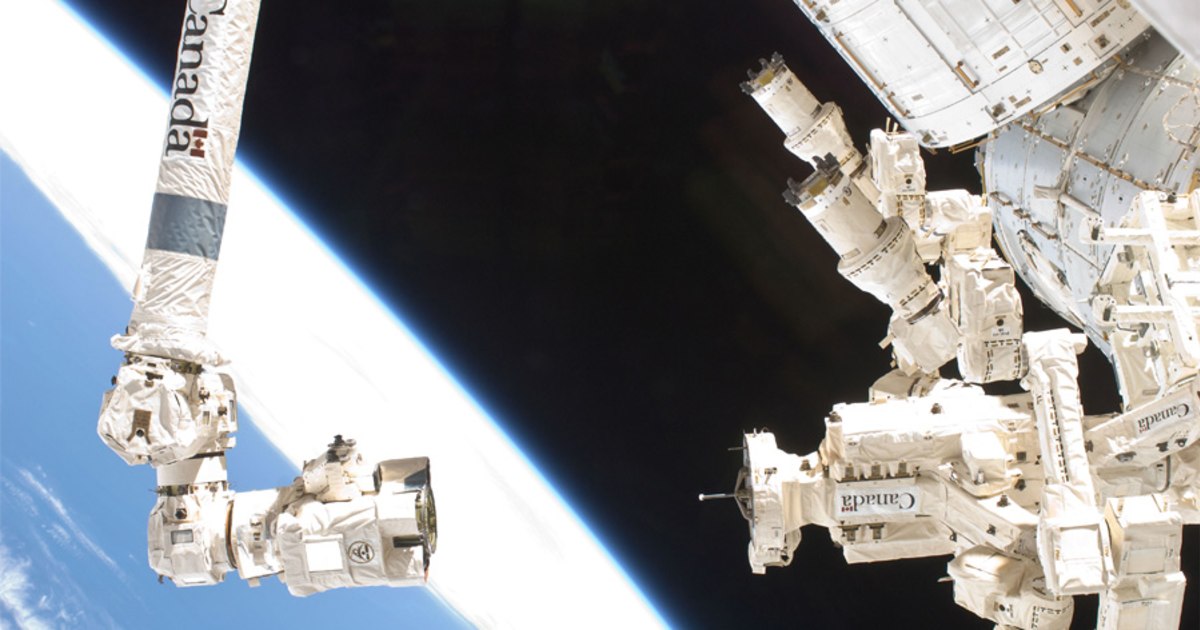 Robot makes repair outside orbiting space station