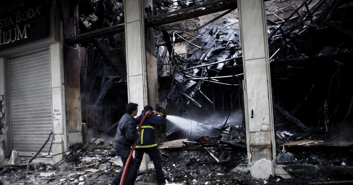 'Athens is in flames': Rioters burn 45 buildings as Greek government ...