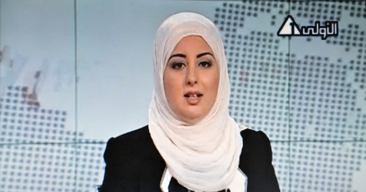 Veiled female news anchor marks wane of secular Egypt