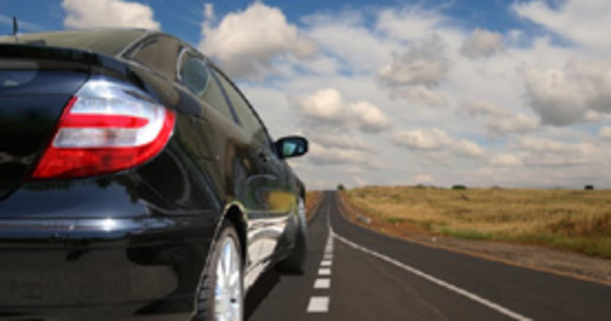 Device powers cell phone using car's wake
