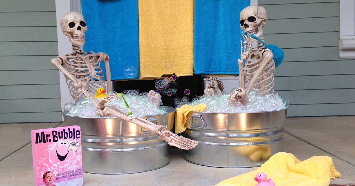 Couple Decorates House With Skeleton Scenes