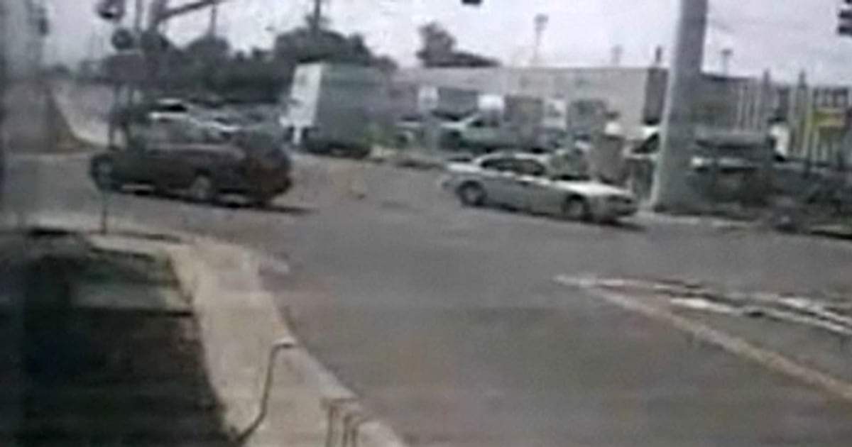 Car vs. train collision caught on video