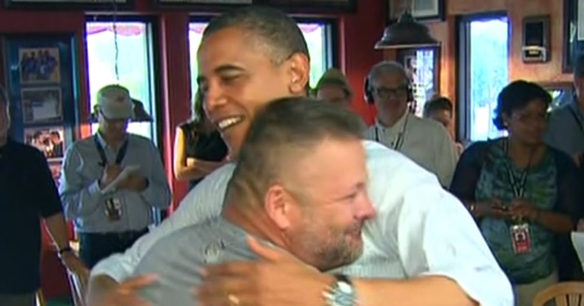 Hugging President Obama