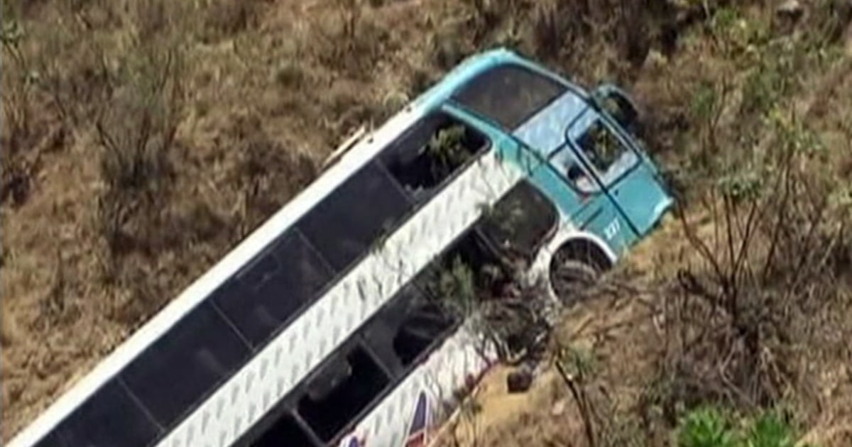Bus plunges off 820-foot cliff killing 22 people