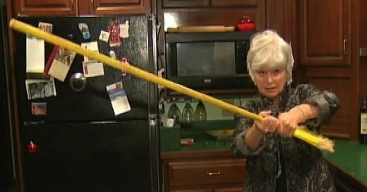 Woman scares off intruders with broom
