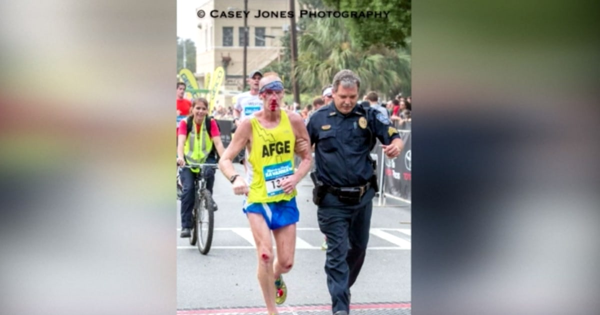 Officer Helps Injured Runner Finish Race