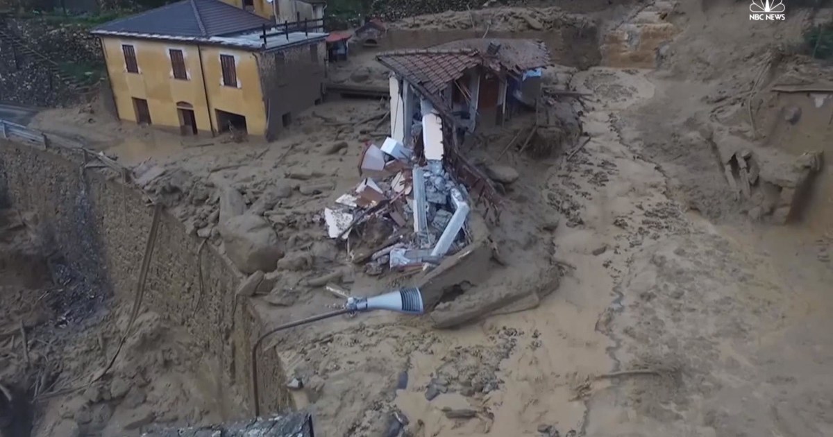 Stream of Mud and Rubble Sweeps Italian Village