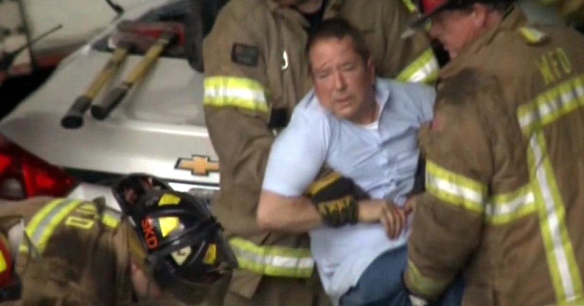 Amazing Rescue: Semi Crushes Car, Driver Survives