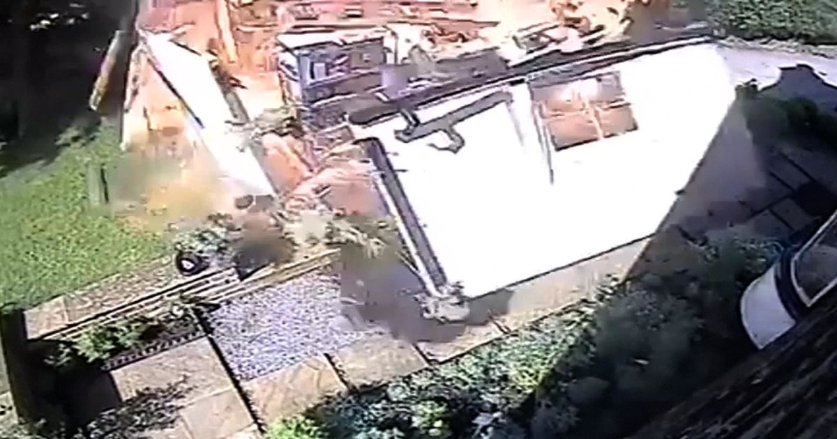 Surveillance video of shed exploding in northern England